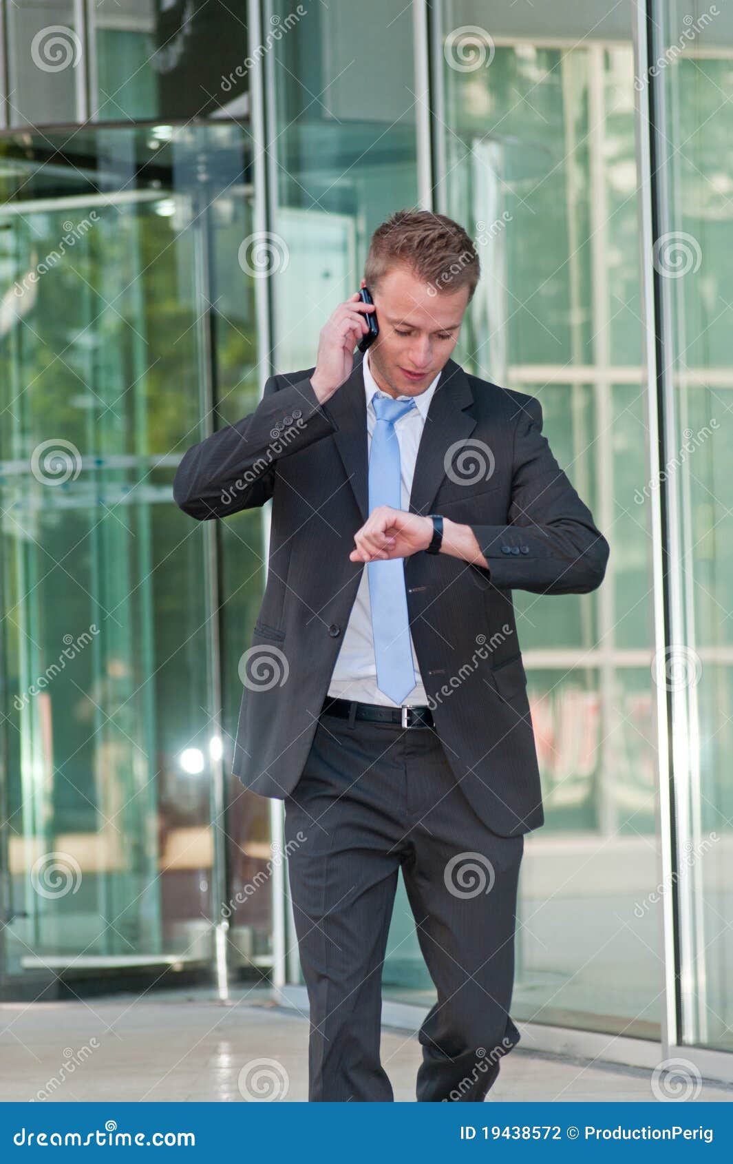 Young Business Man Being Late Stock Photo - Image of grey, people: 19438572