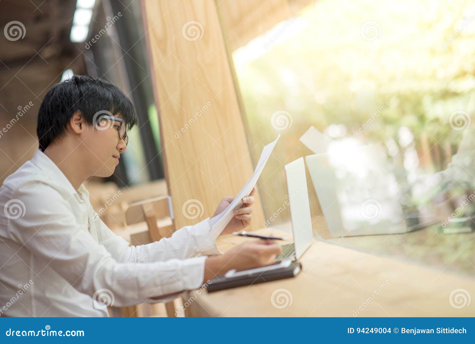 Young Business Man Checking Report Document Stock Photo - Image of data ...