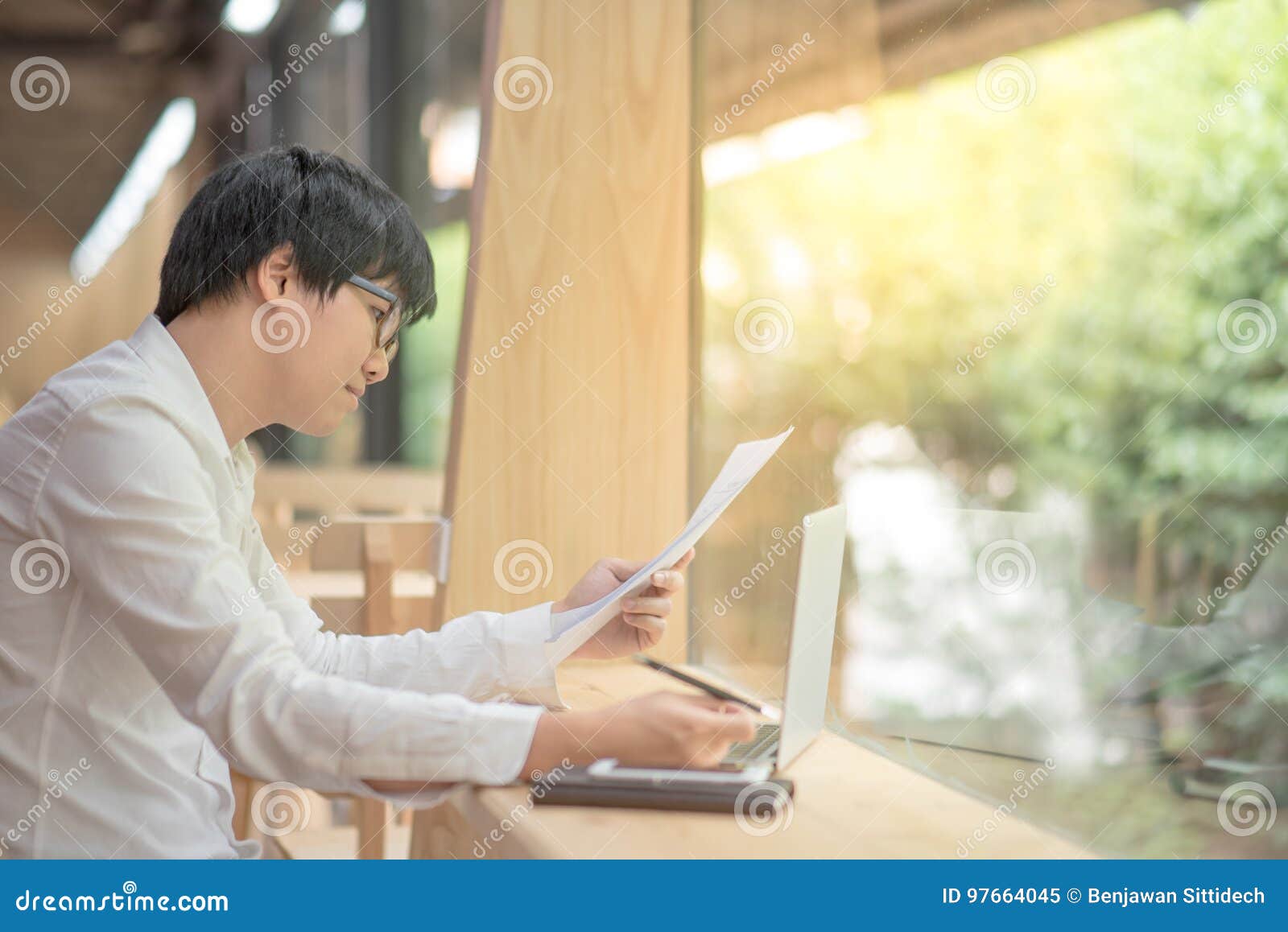 Young Business Man Checking Report Document Stock Image - Image of ...
