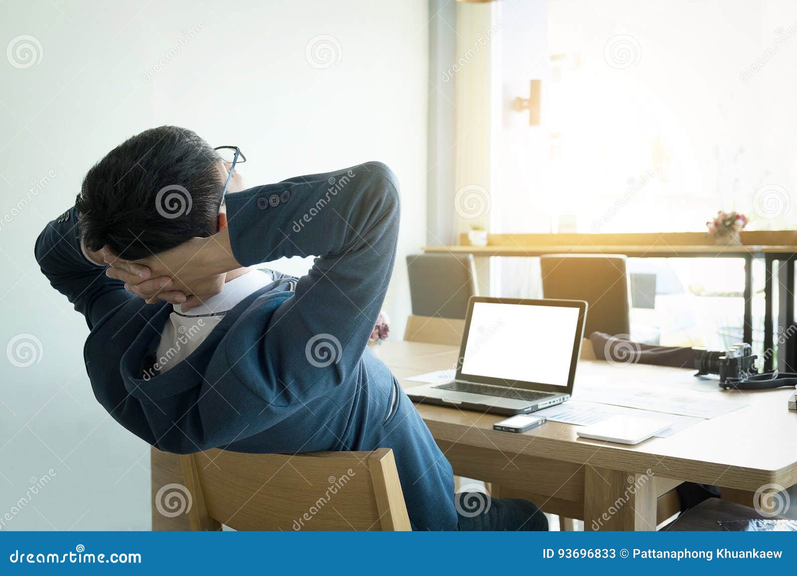 Young Business Man Having a Little Rest after Work in Office Stock ...