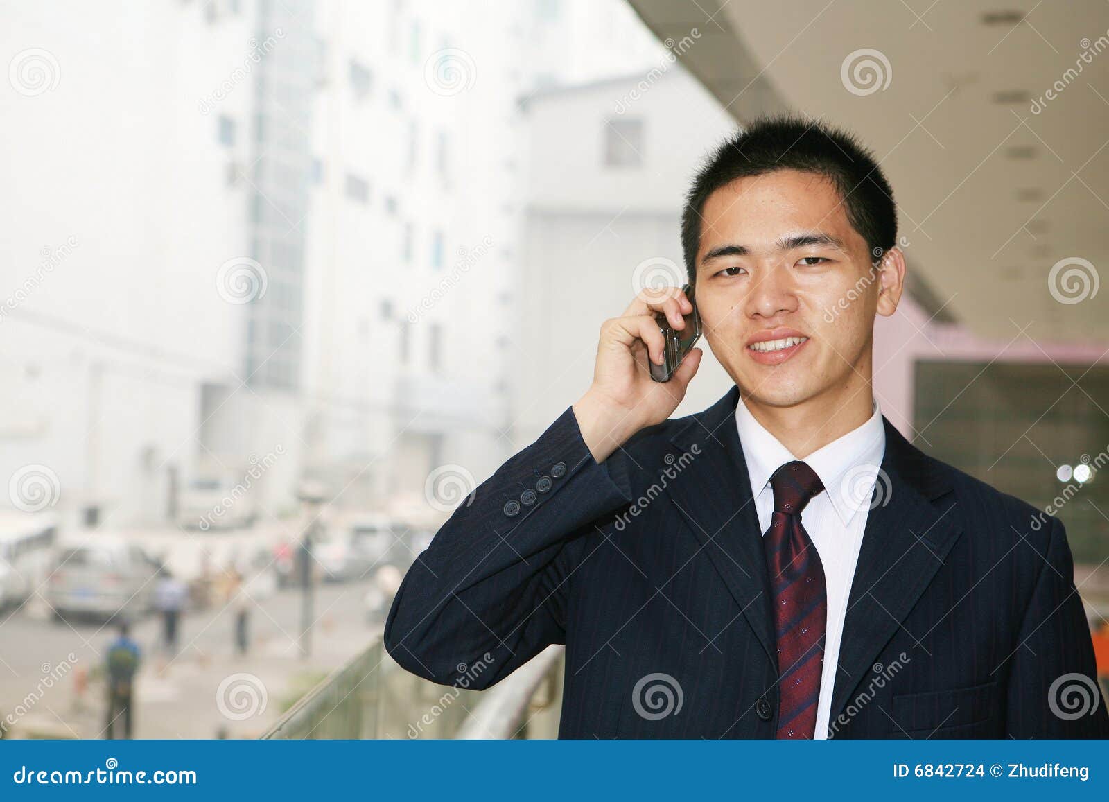 Young Business Man Holding Mobile Phone Stock Photo - Image of phone ...