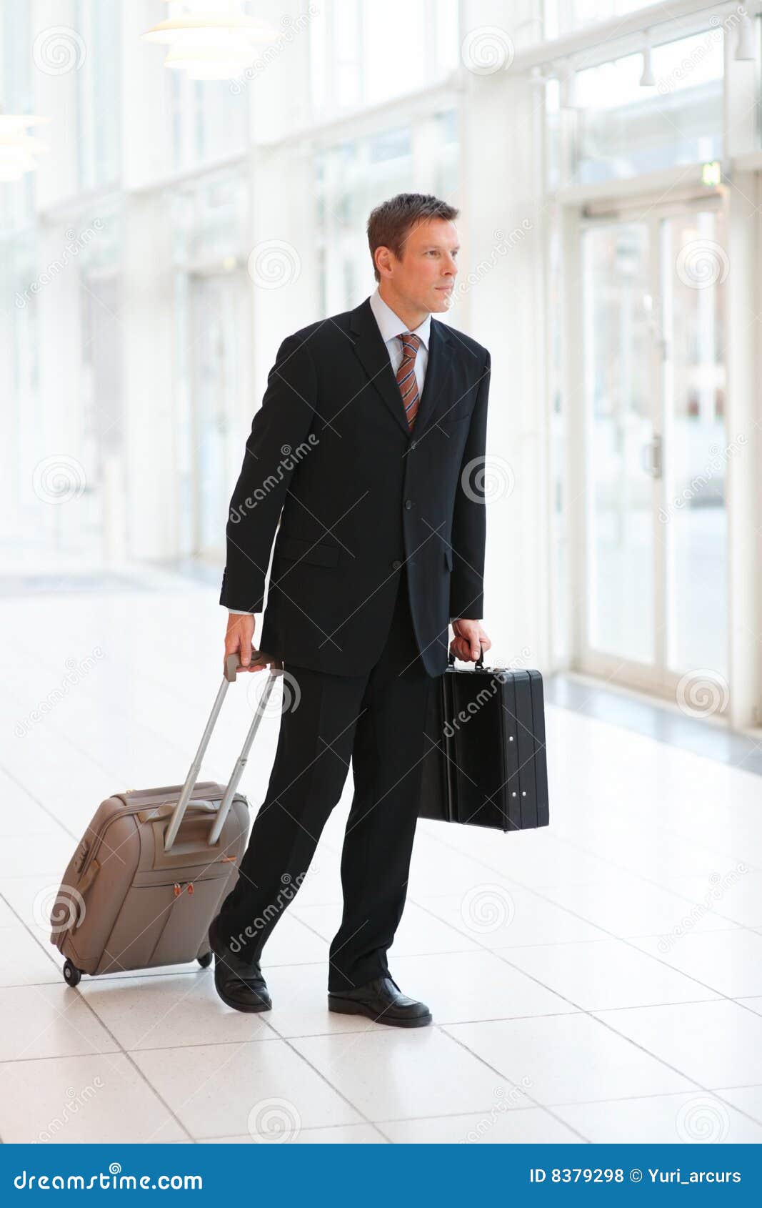 Young Business Man Holding a Suitcase and Bag Stock Photo - Image of ...