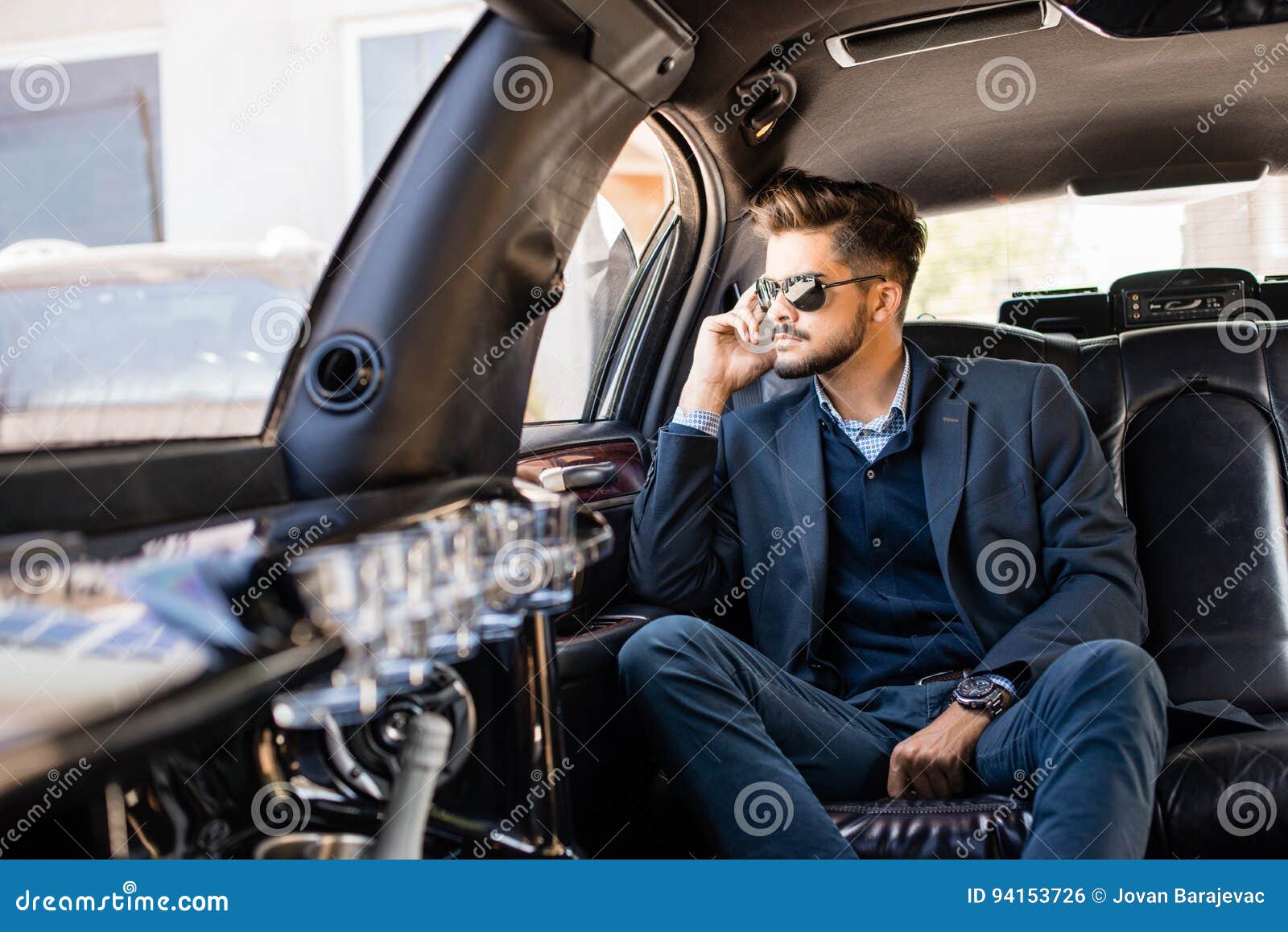 Young business man in limo stock photo. Image of finance - 94153726