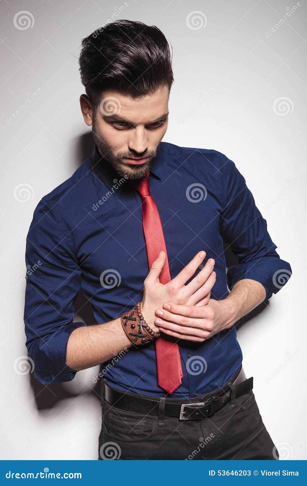 Young Business Man Looking Down Stock Image - Image of happy, shirt ...