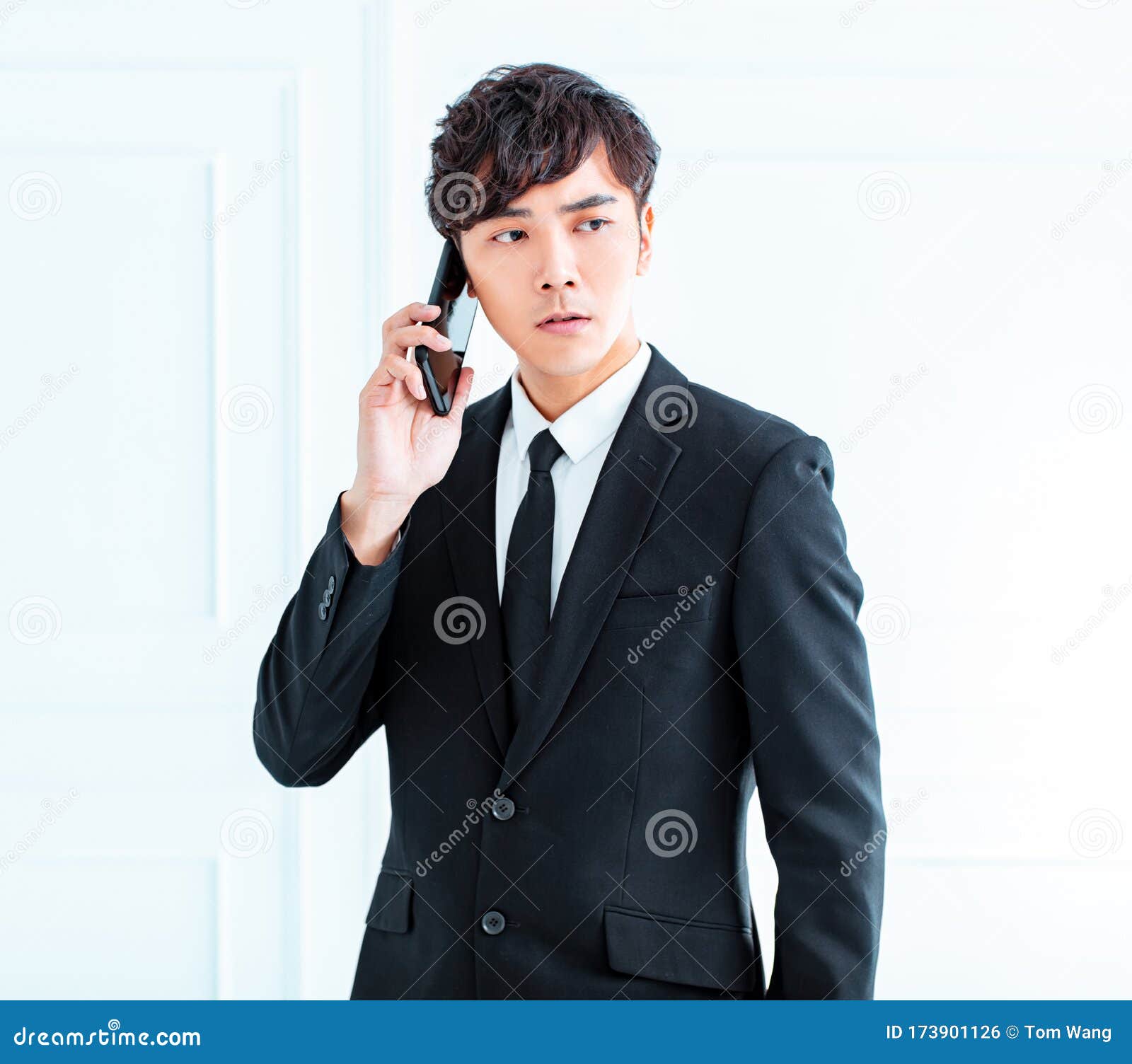 Young Business Man Making Phone Call with Smartphone Stock Photo ...