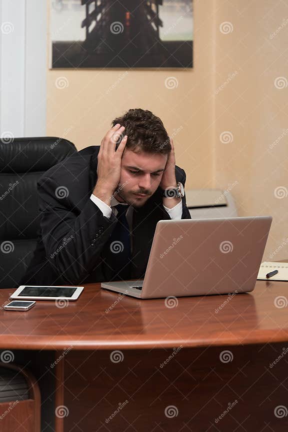 Young Business Man with Problems in the Office Stock Image - Image of ...
