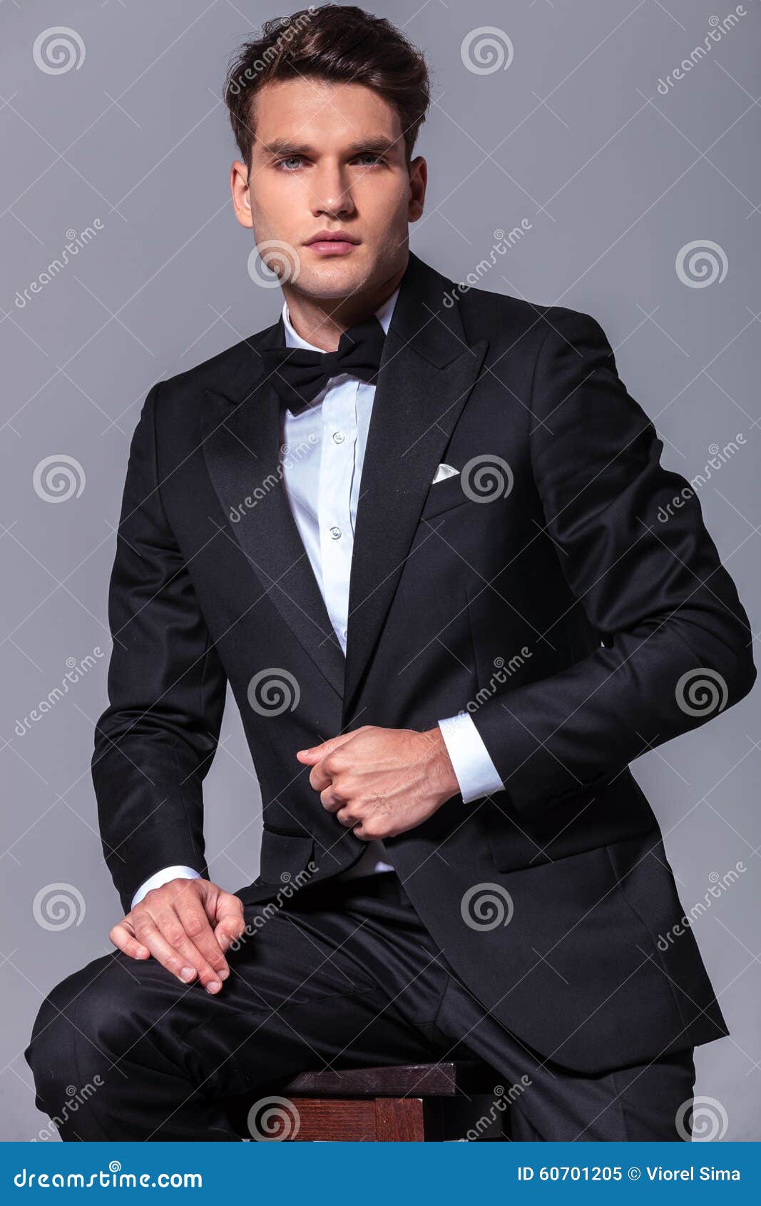 Young Business Man Pulling His Jacket Stock Image - Image of sitting ...
