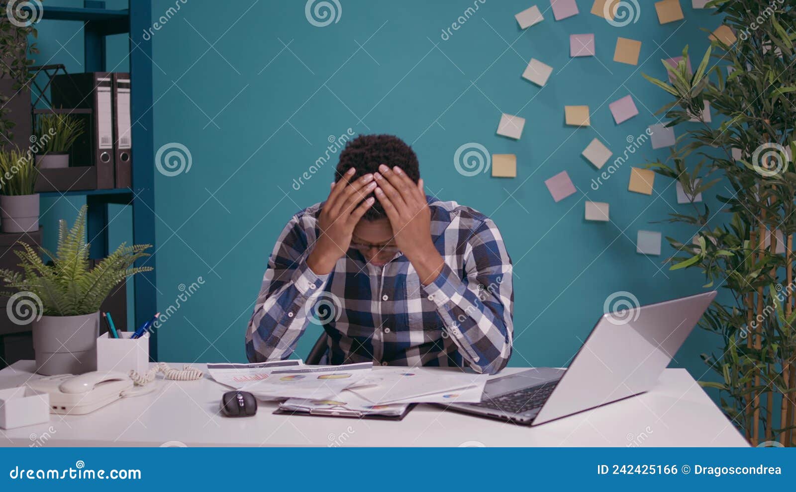 Young Business Man Sorting Out Financial Charts on Papers Stock Footage ...
