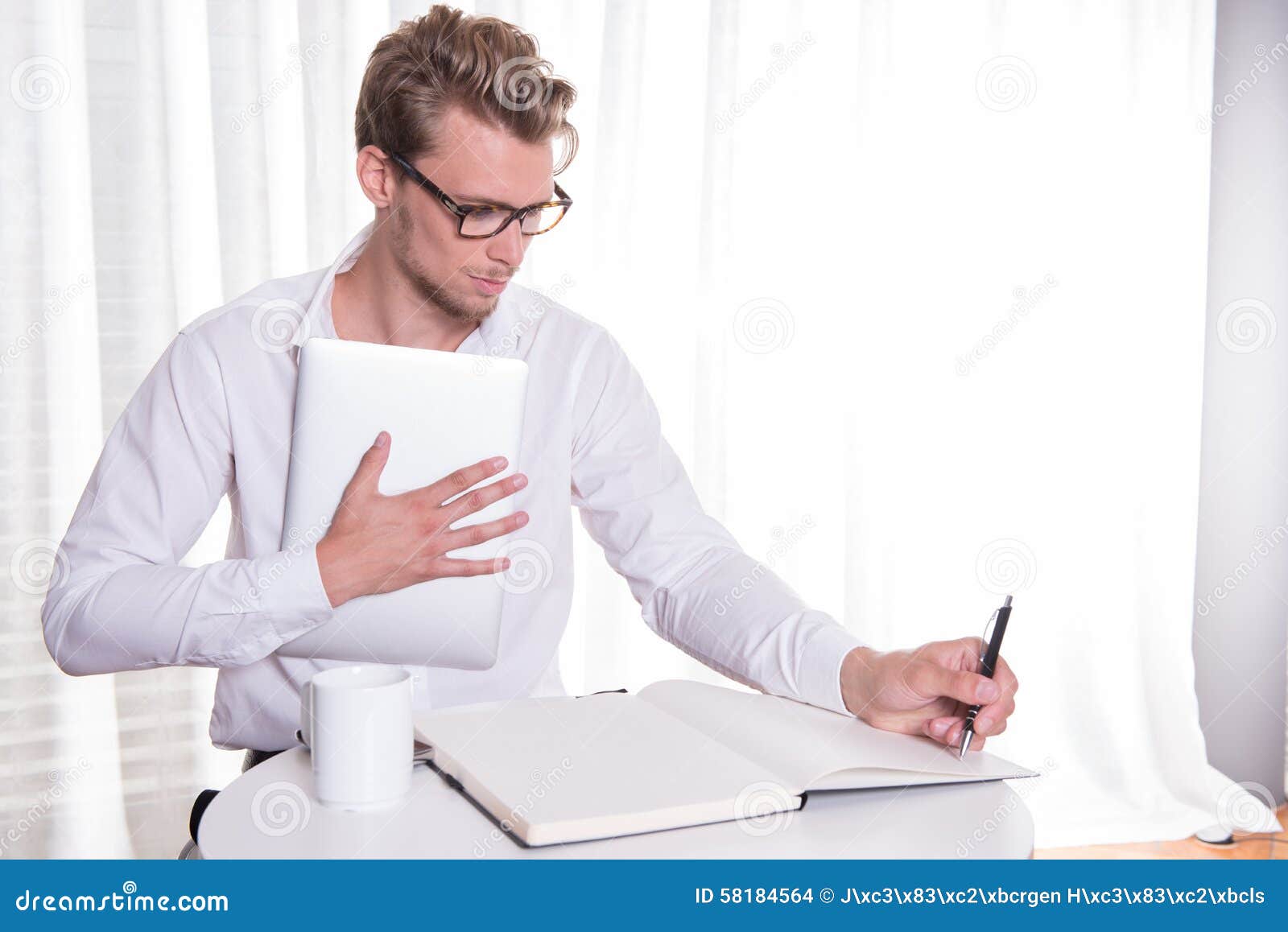 Young Business Man Taking Notes Stock Photo - Image of client, laptop ...