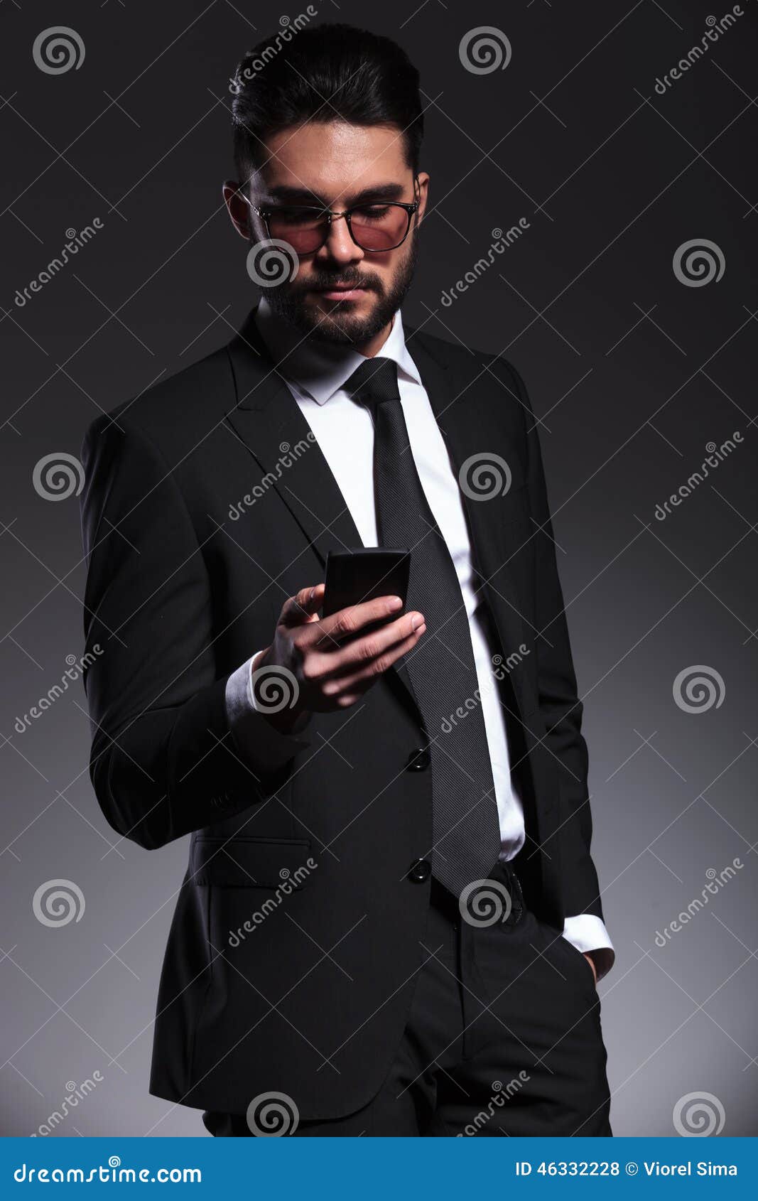 Young Business Man Texting on His Smartphone Stock Photo - Image of ...