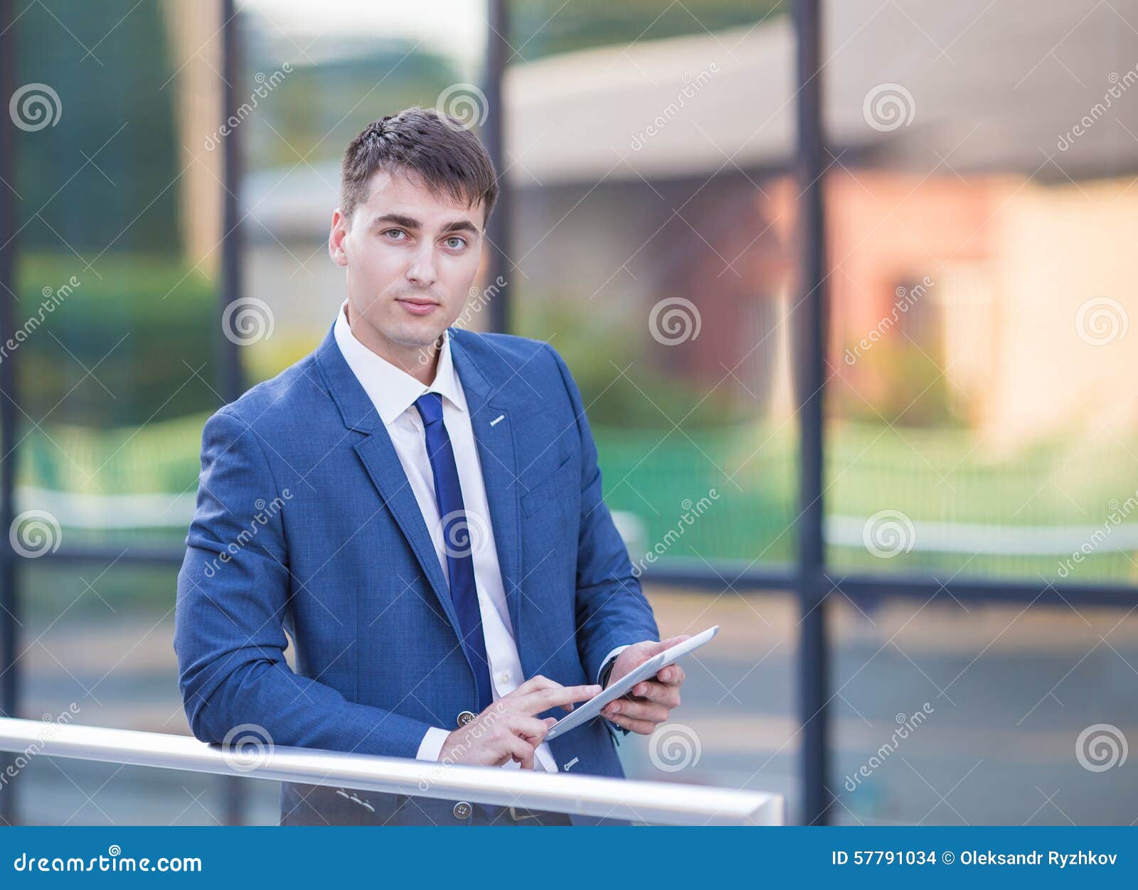 Young Business Man Think Look Up Hold Tablet Pc Stock Photo - Image of ...