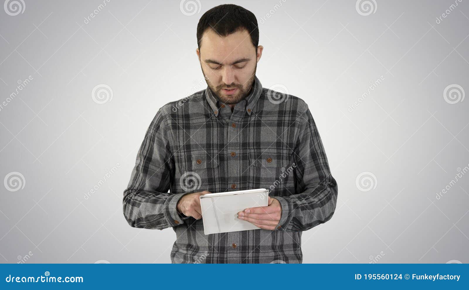 Young Business Man Using His Tab Walking on Gradient Background. Stock ...