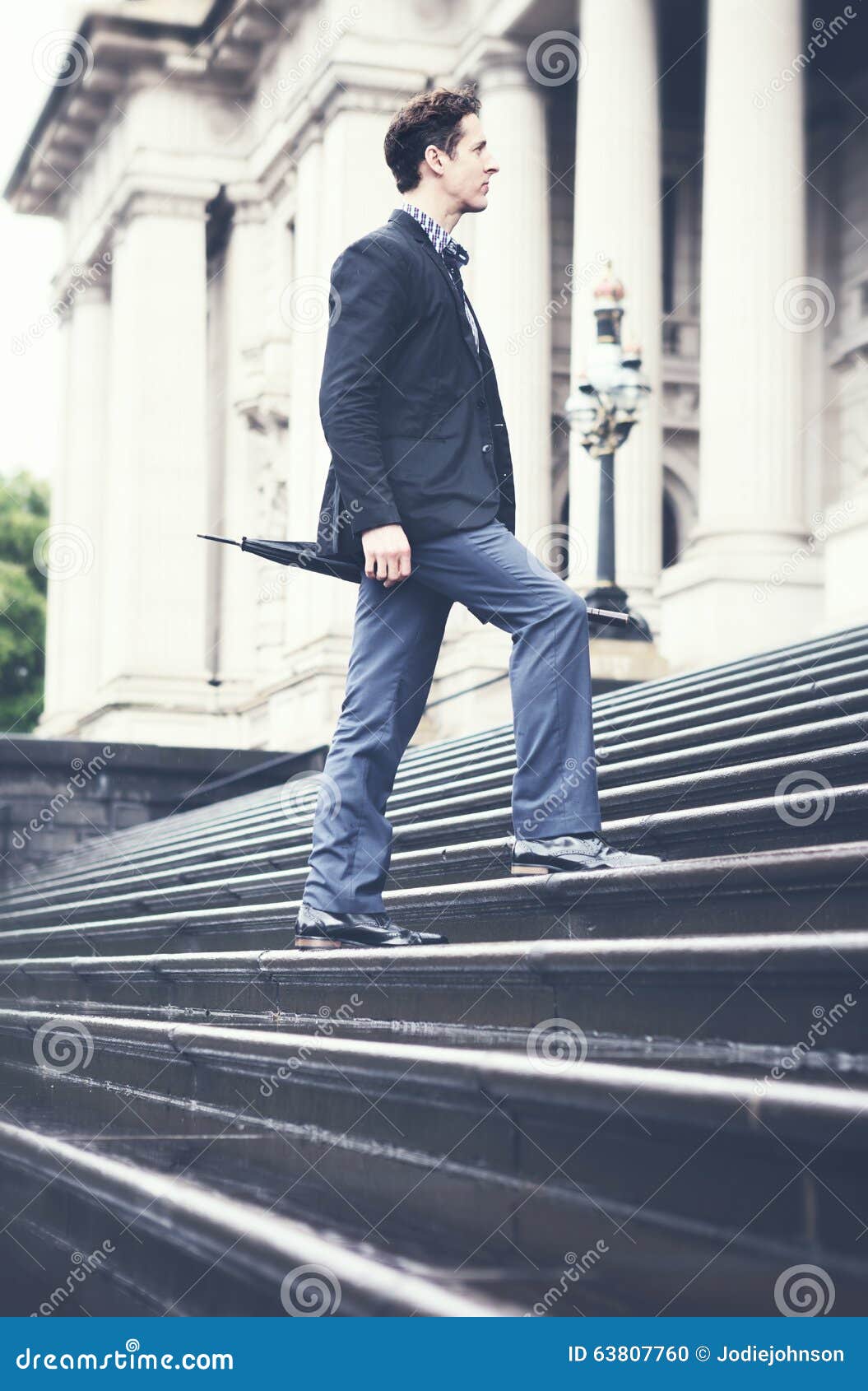 Young Business Man on Way To Work Climbing Steps Stock Photo - Image of ...