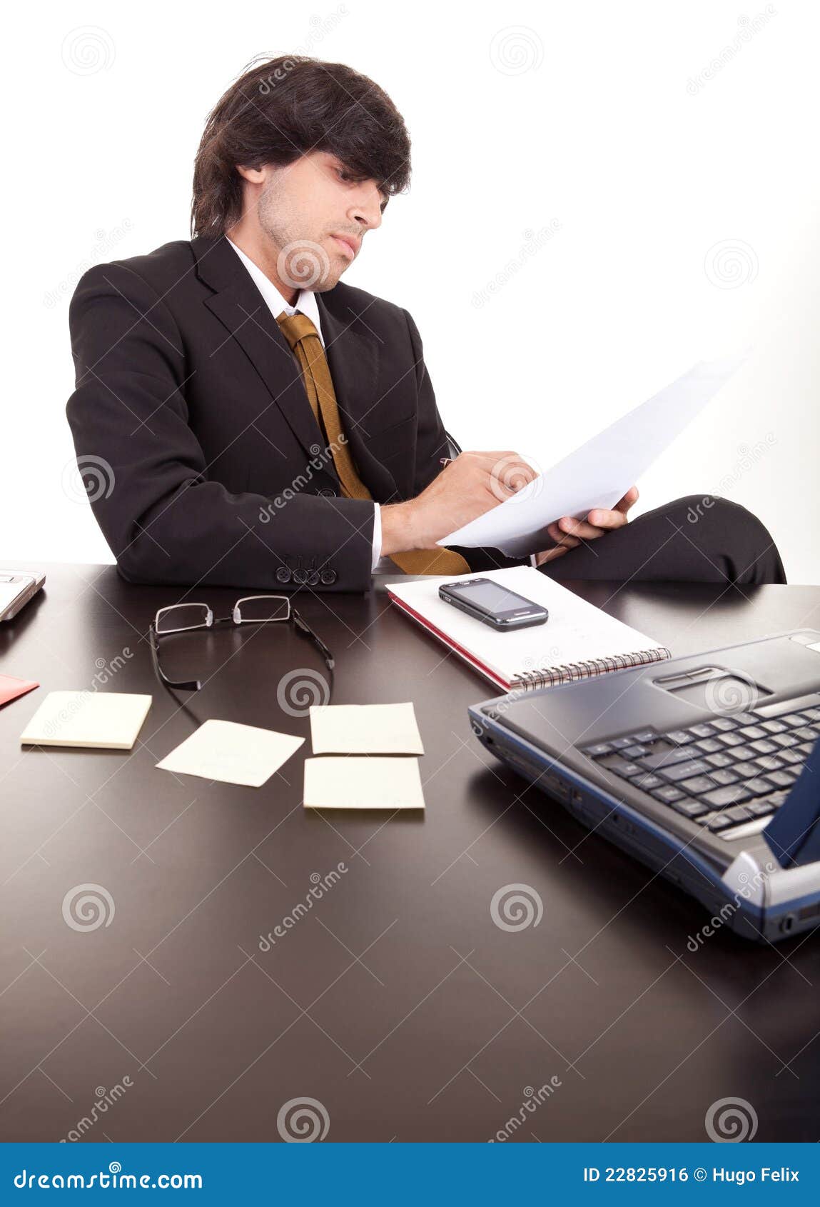 Young business man at work stock photo. Image of paperwork - 22825916