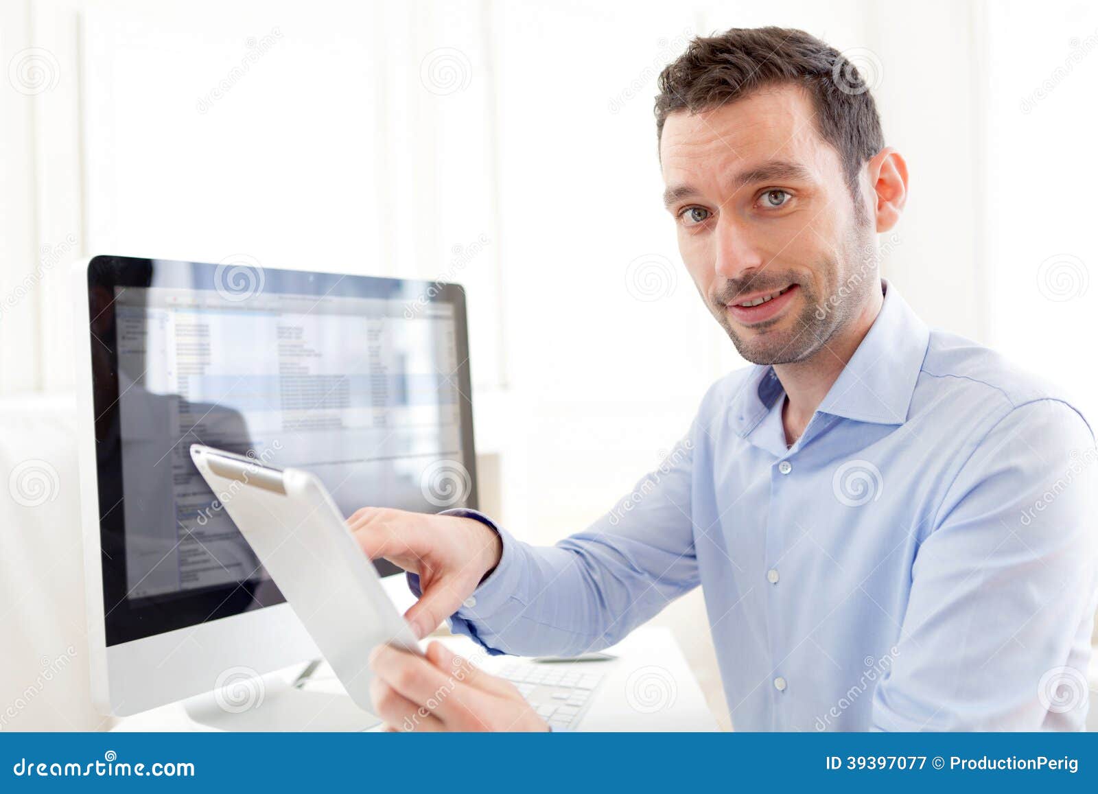 Young Business Man Working at Home on His Tablet Stock Image - Image of ...