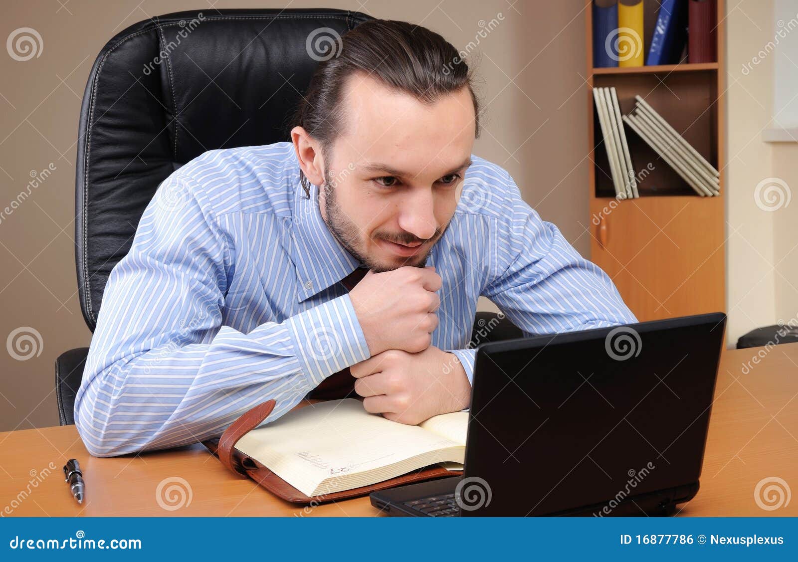 Young Business Man Working in an Office Stock Photo - Image of ...