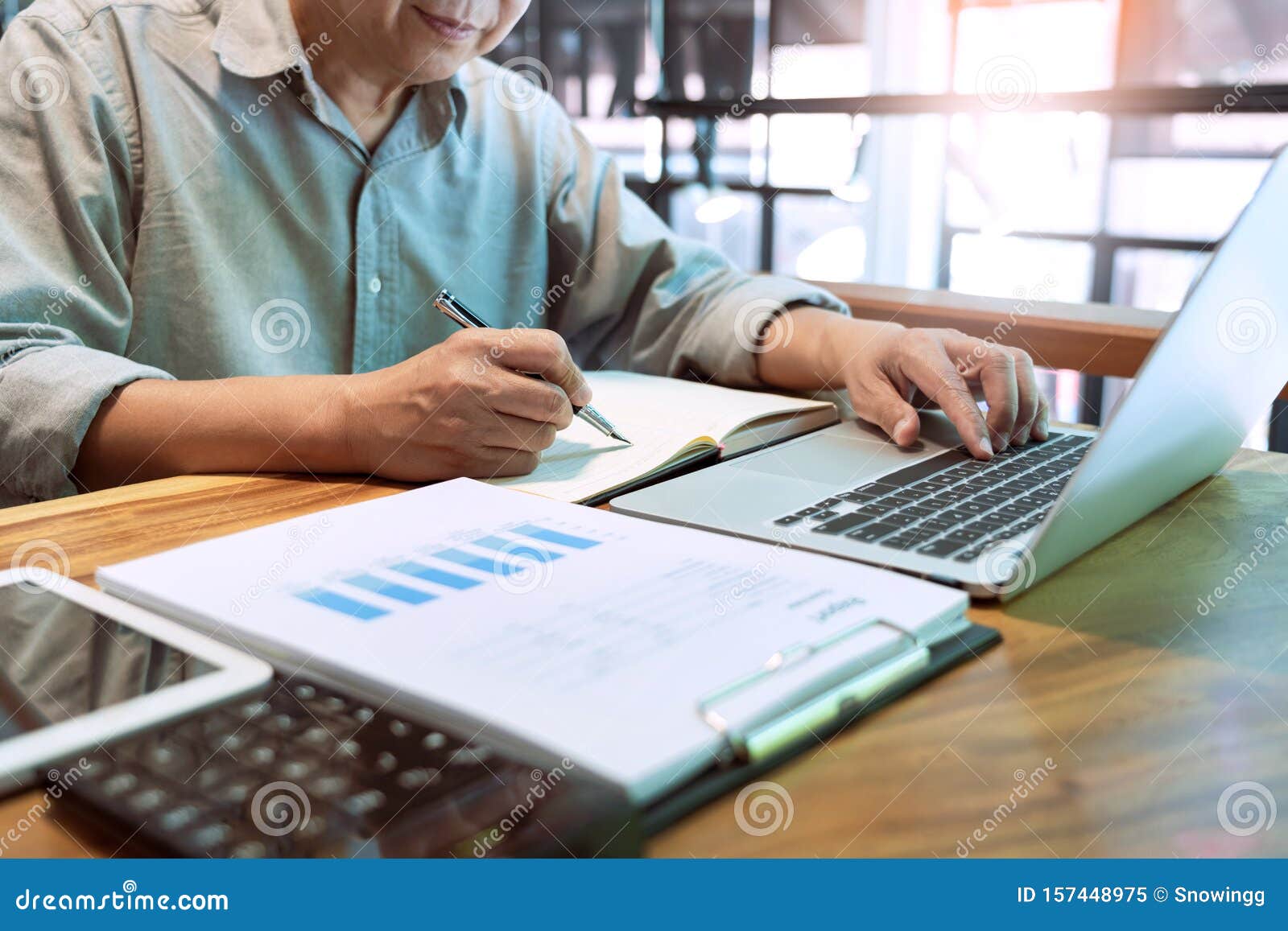 Young Business Man Working Sitting at Desktop Computer at His Desk in ...