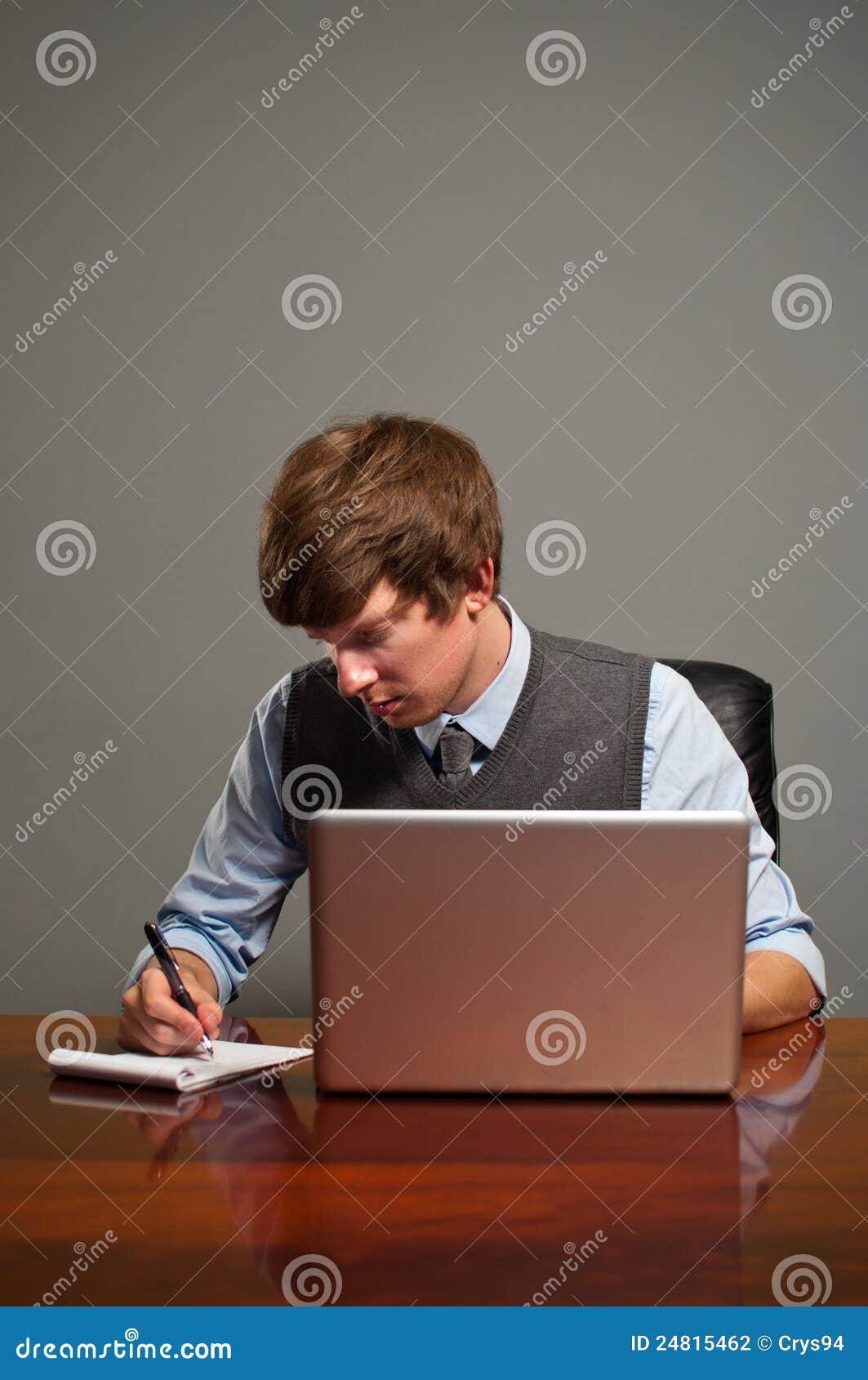 Young Business Man Writing on Notepad Stock Photo - Image of smart ...