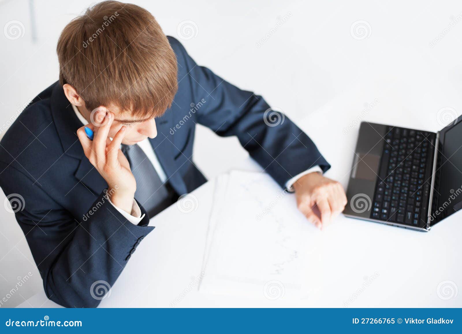 Young Business Man Writing on Paperwork Stock Image - Image of people ...