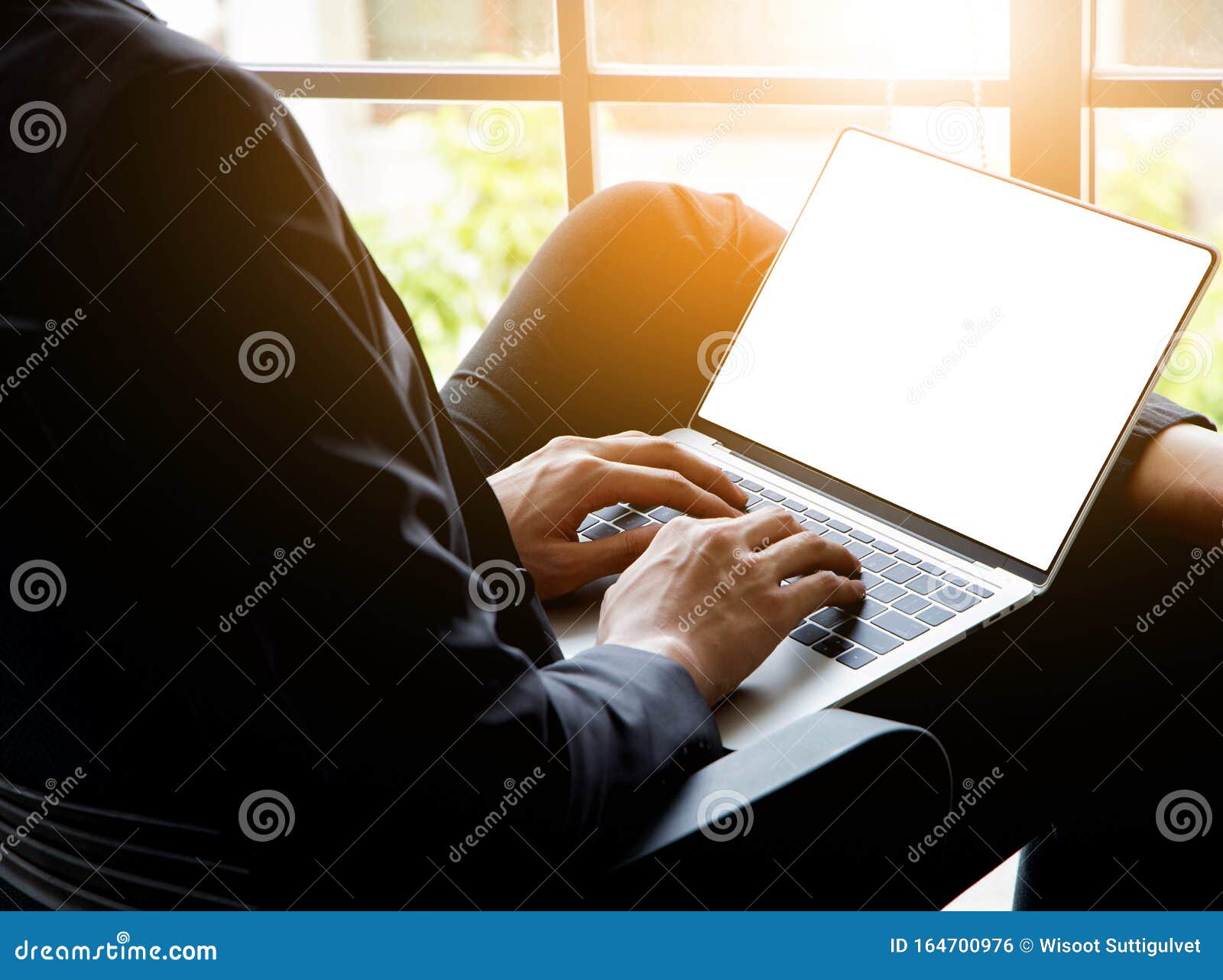 Young Business Men Sit and Work in the Office he Put the Laptop ...