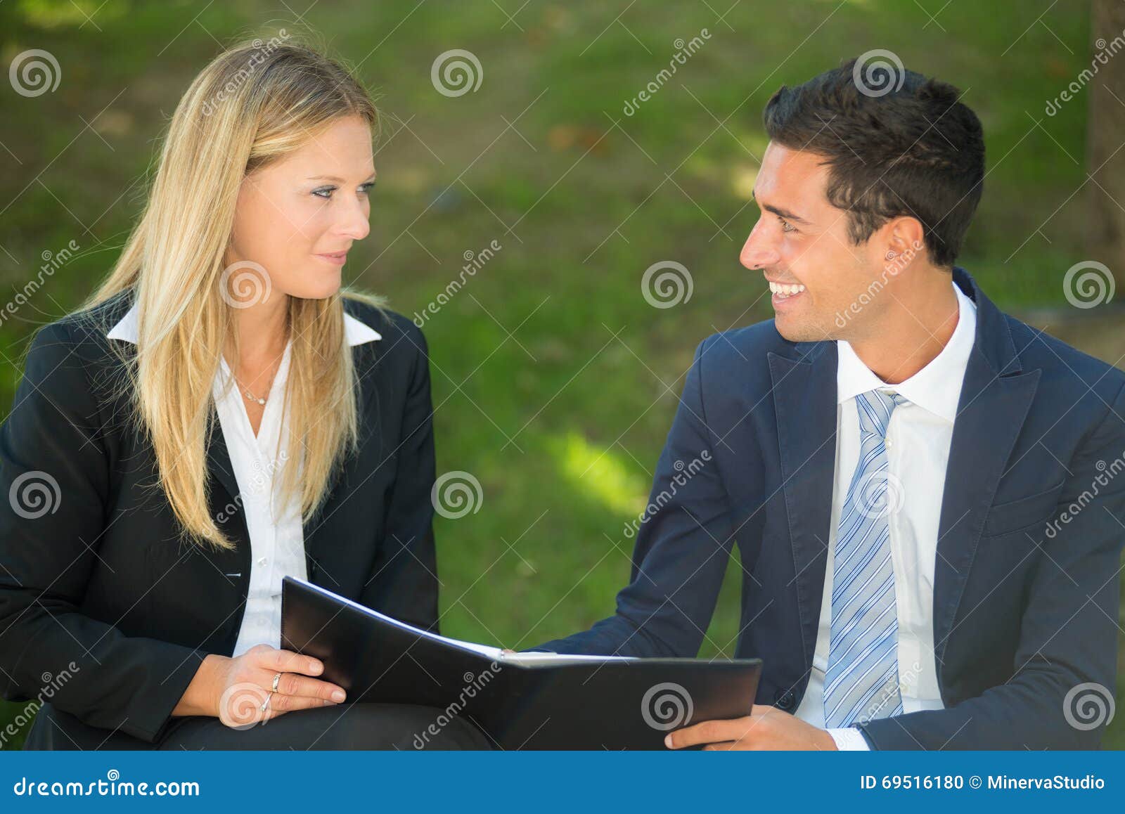 Young Business People Discussing Outdoors Stock Photo - Image of ...