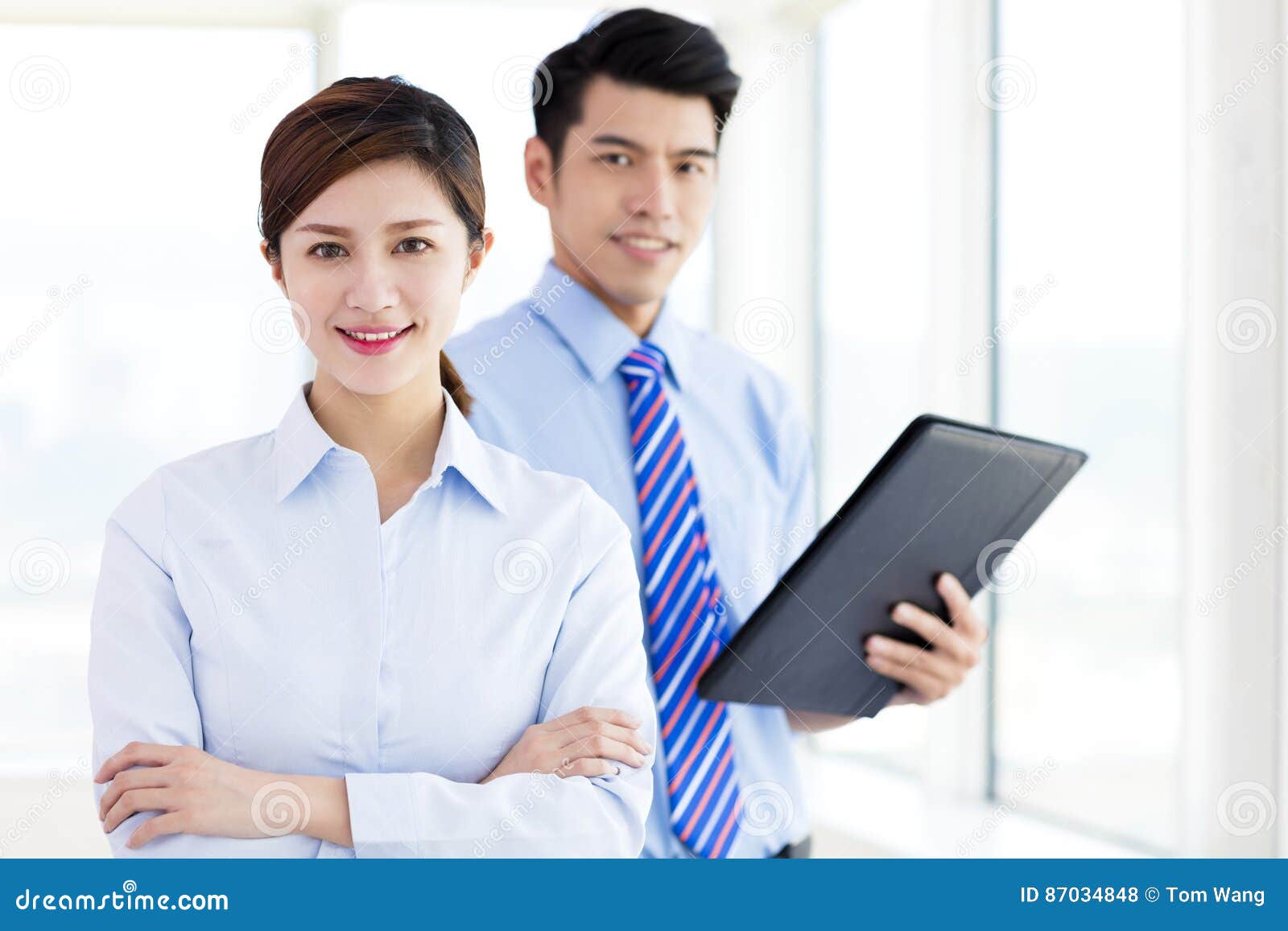Young Business People Standing in Office Stock Photo - Image of ...