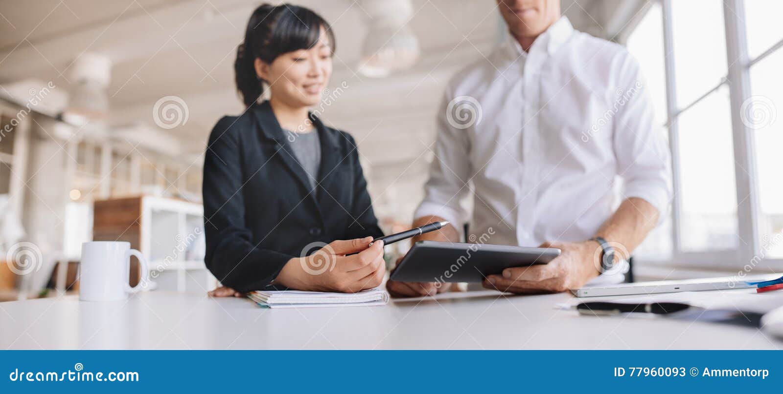 Young Business People Using Digital Tablet at Work Stock Image - Image ...