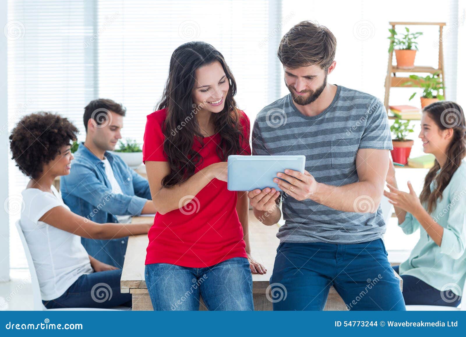 Young Business People Using a Tablet Stock Photo - Image of coworkers ...