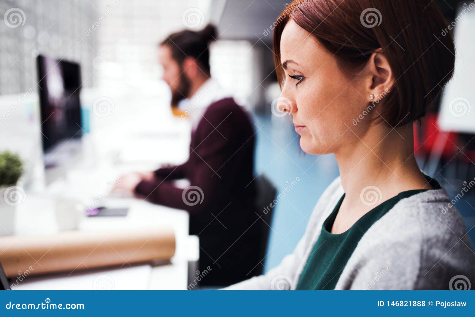 Young Business People Working in Office, Using Computer. Stock Photo ...