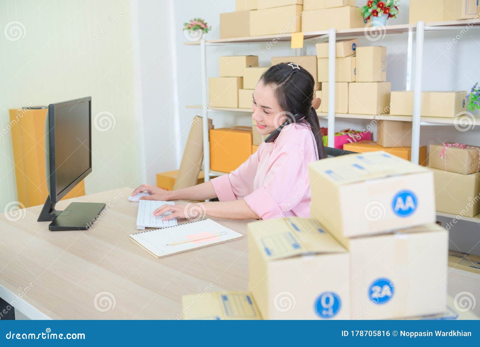 Young Business Start Up Online Seller Owner Using Computer for Checking ...