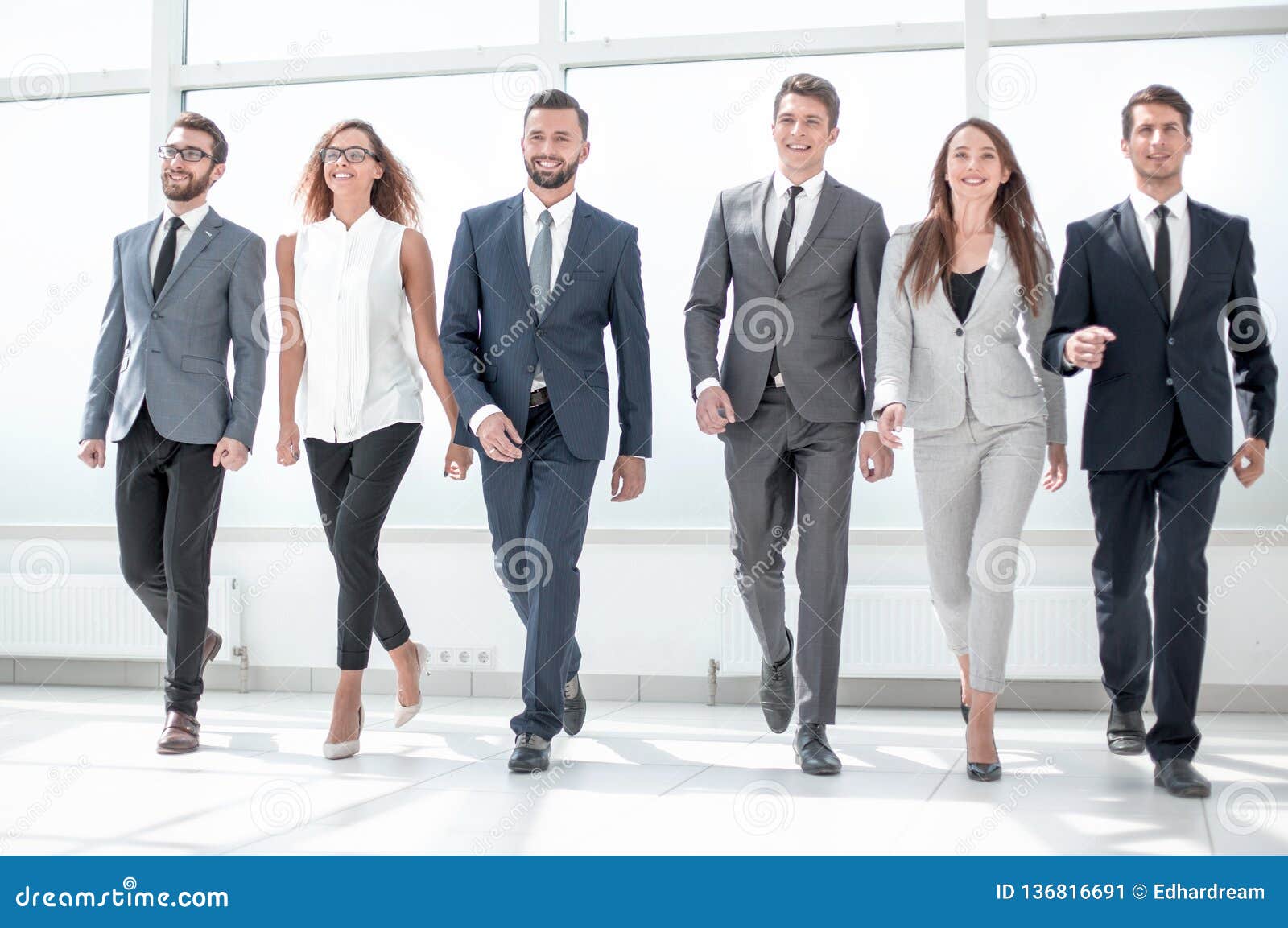 Young Business Team Confidently Stepping Forward Stock Image - Image of ...