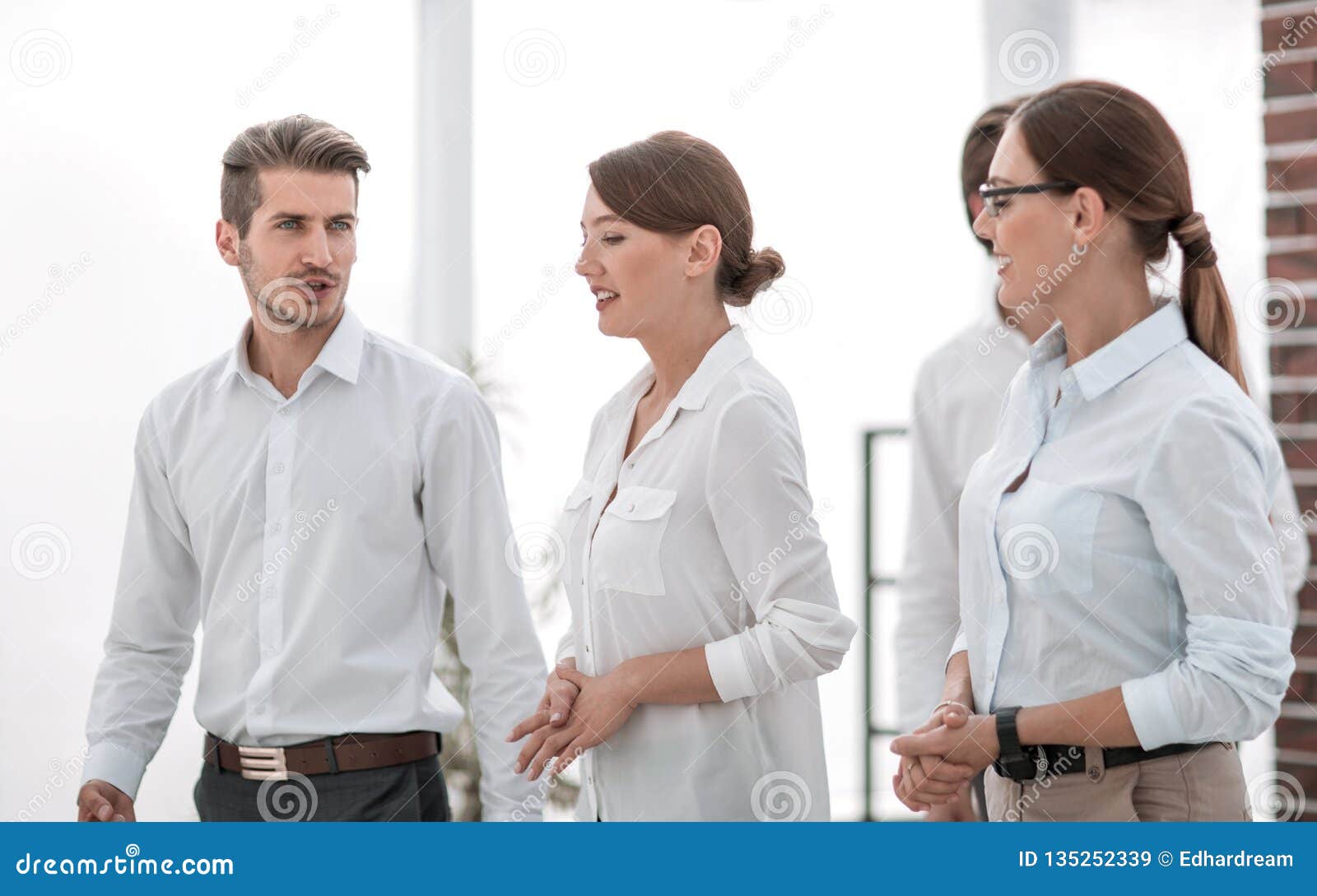 Young Business Team Standing in the Office Stock Image - Image of ...