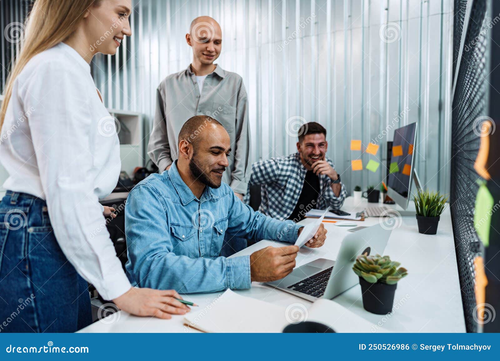 Young Business Team Working on a Project in Office. Stock Photo - Image ...