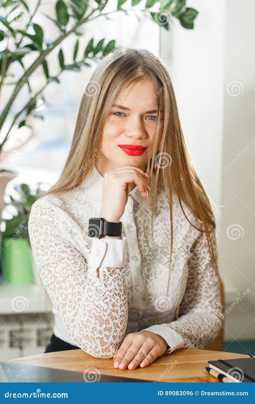 Young Business Woman Checking the Time on Her Watch. Stock Photo ...