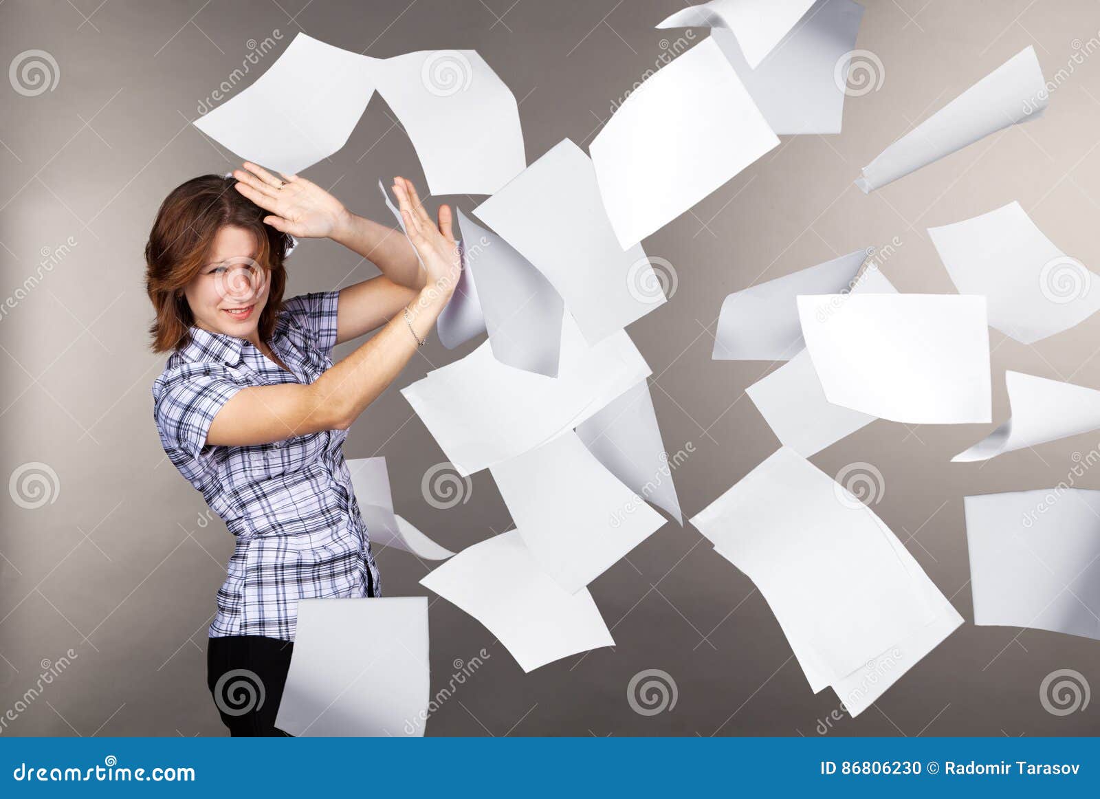 Young Business Woman with Flying Documents Stock Photo - Image of paper ...