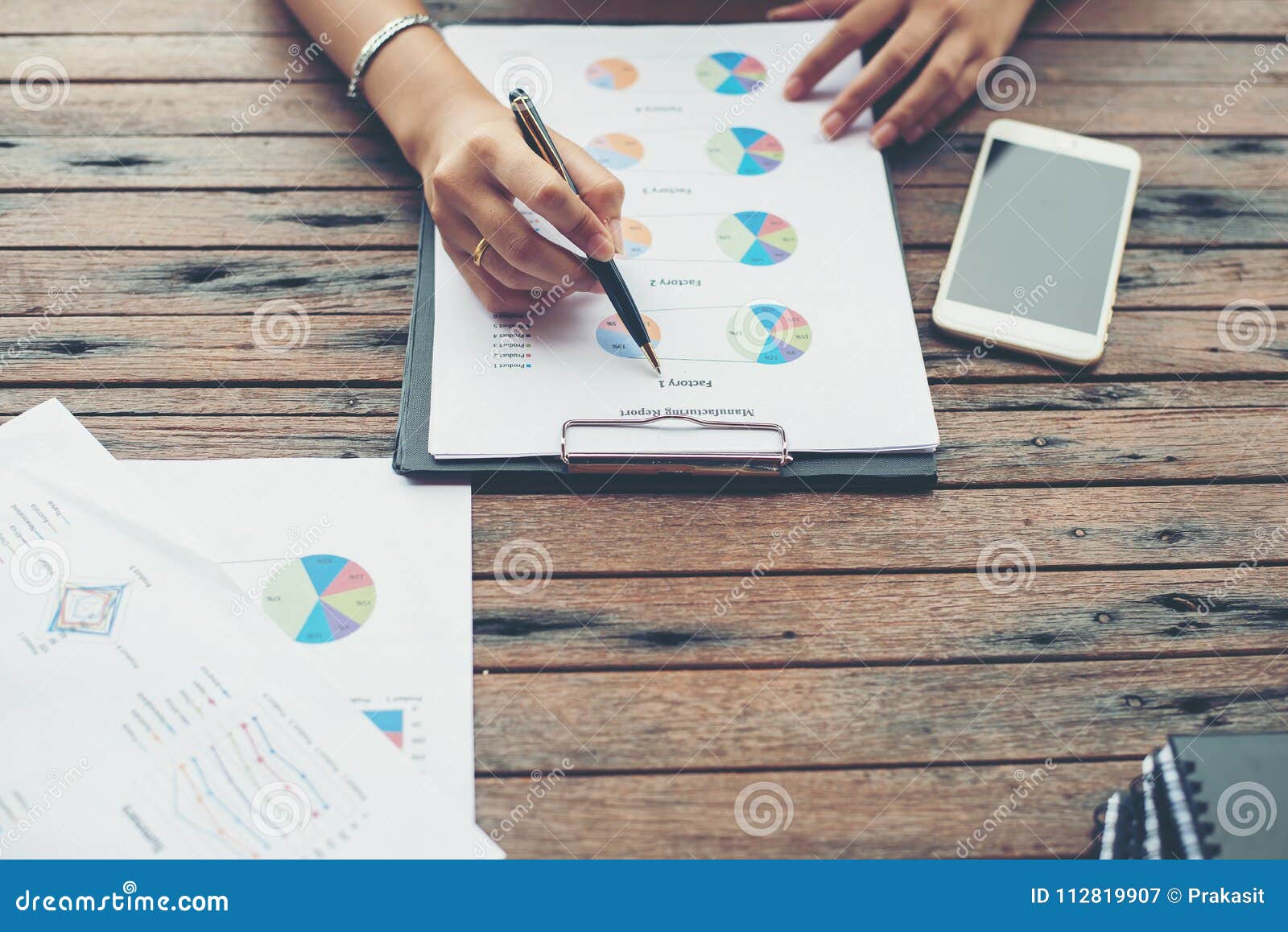 Young Business Woman Hands Analysis with Business Chart on Workplace ...