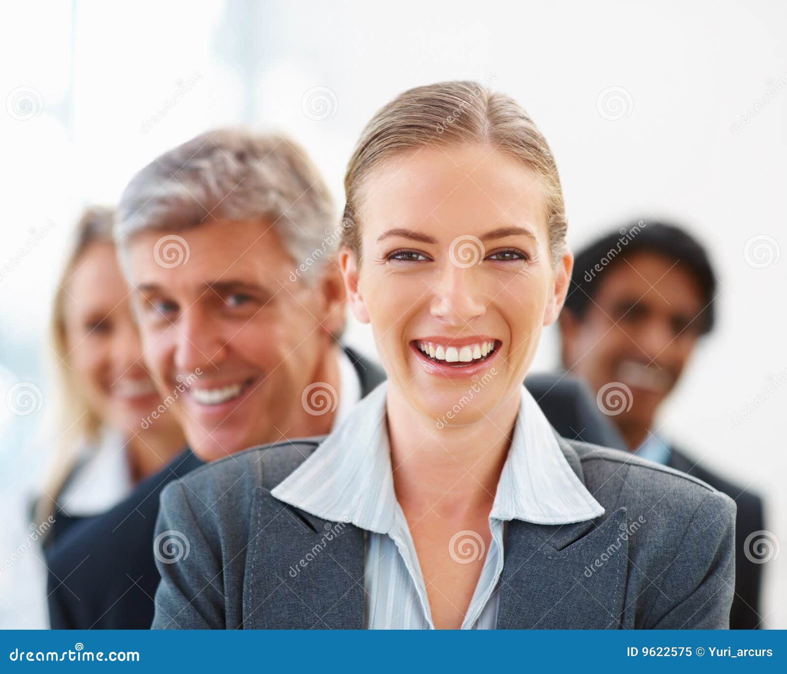 Young Business Woman with Her Staff at the Back Stock Image - Image of ...
