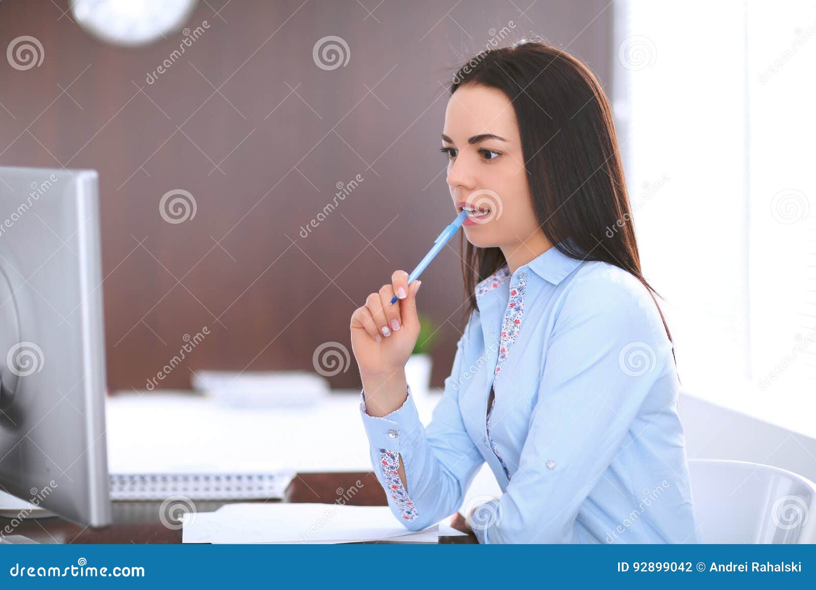 Young Business Woman Sitting a at the Table in Office Stock Photo ...