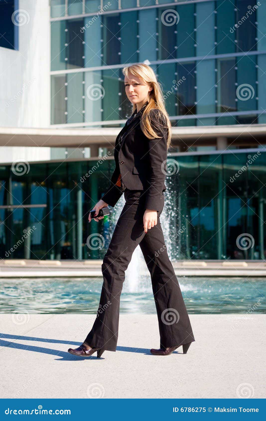 Young Business Woman Walking Stock Image - Image of lady, model: 6786275