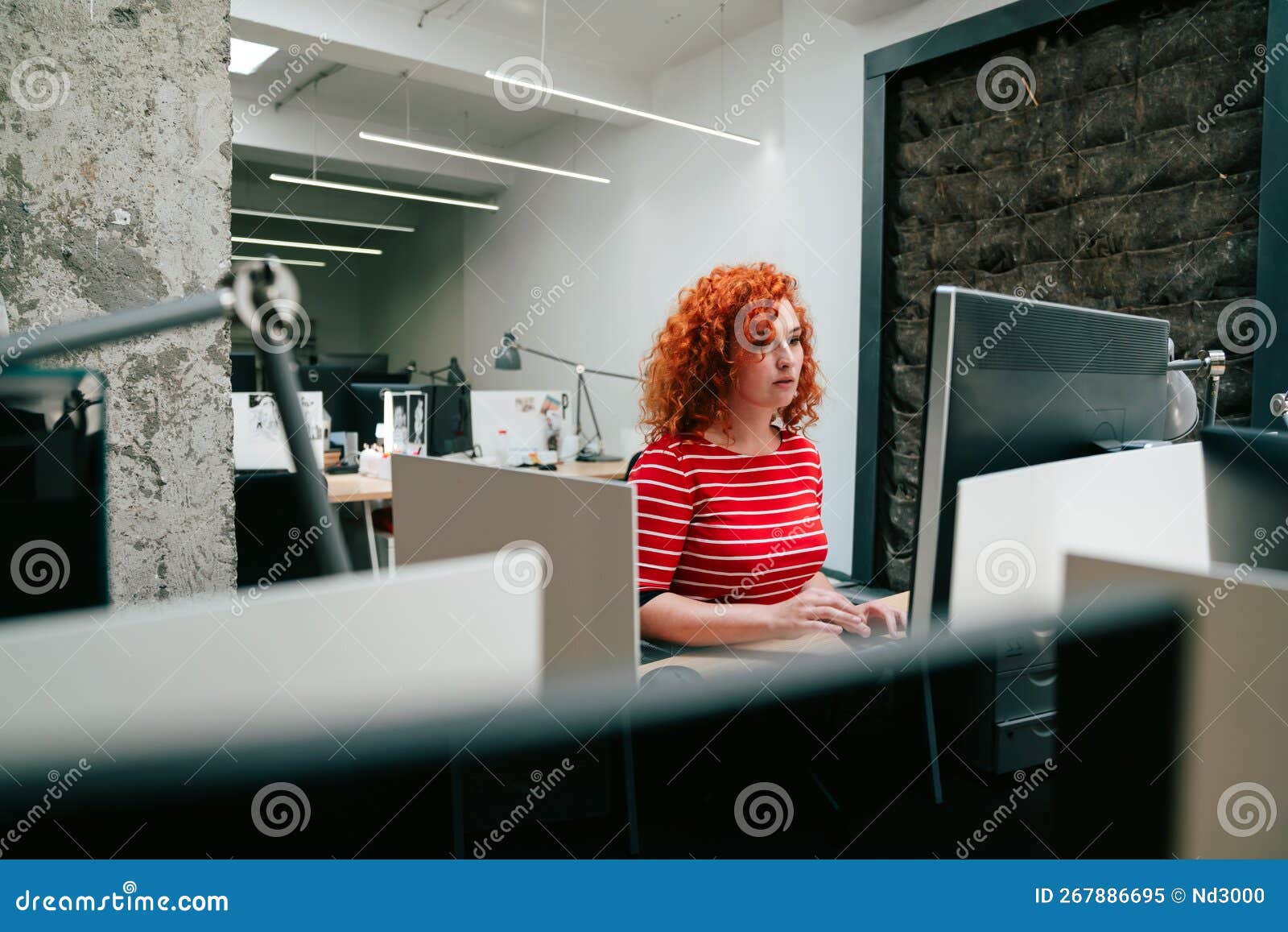 Young Business Woman Working on Desktop Computer at Modern Startup ...