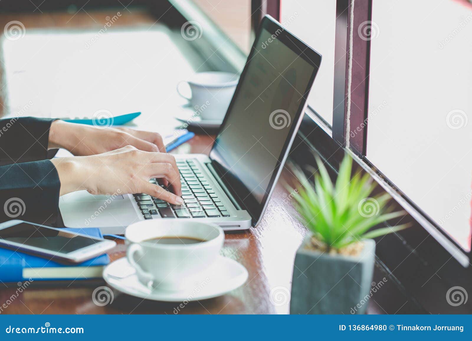 Young Businessman Analyzing Graph on Computer at Workplace Stock Photo ...