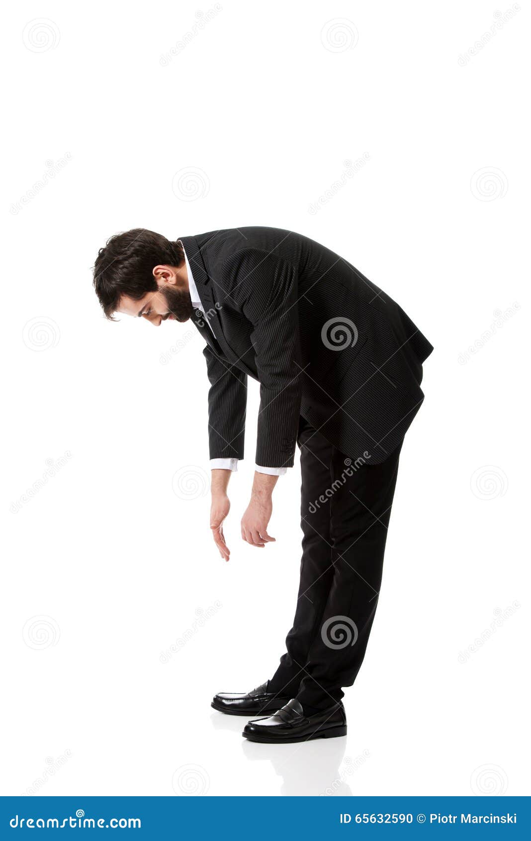 Young Businessman Bending Down. Stock Photo - Image of formal ...