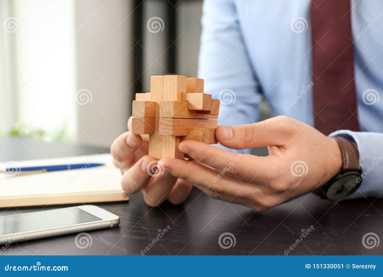 Young Businessman with Brain Teaser at Table in Office Stock Image ...