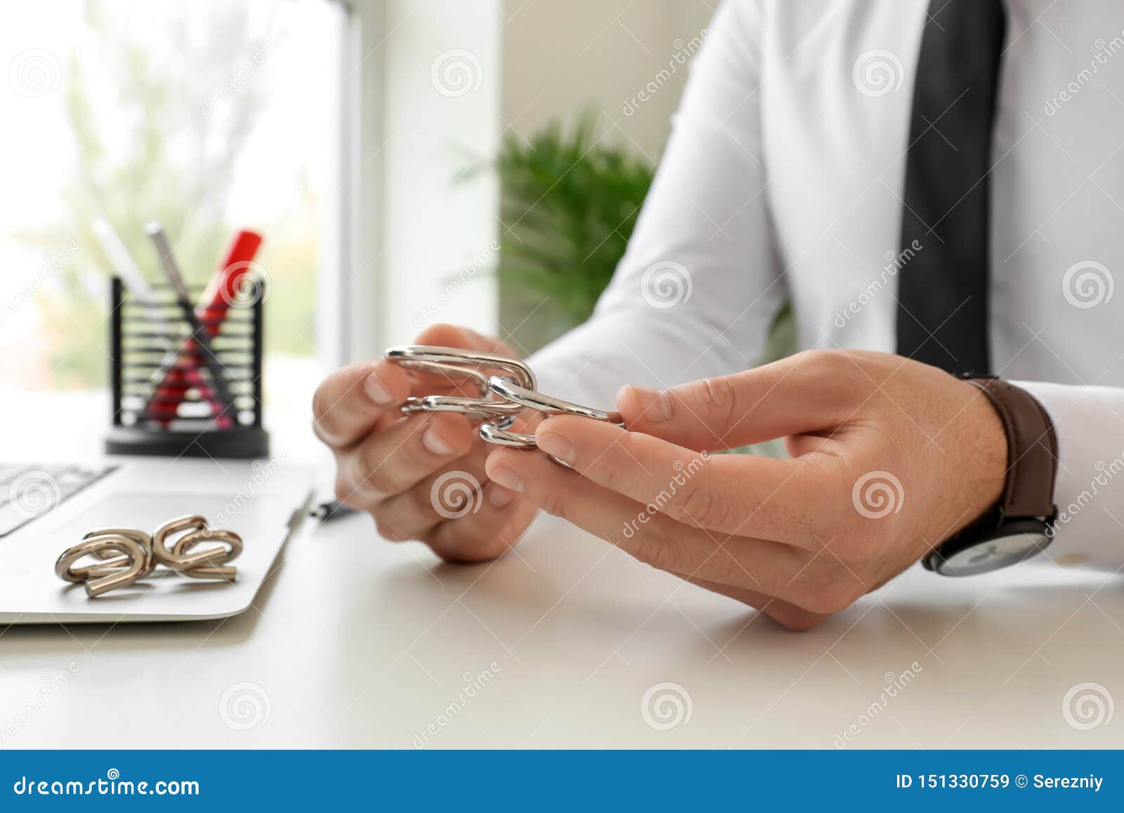 Young Businessman with Brain Teaser at Table in Office Stock Image ...