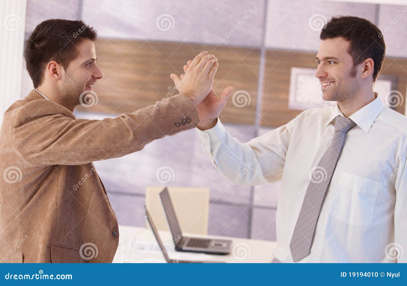 Young Businessman Celebrating Success Smiling Stock Photo - Image of ...
