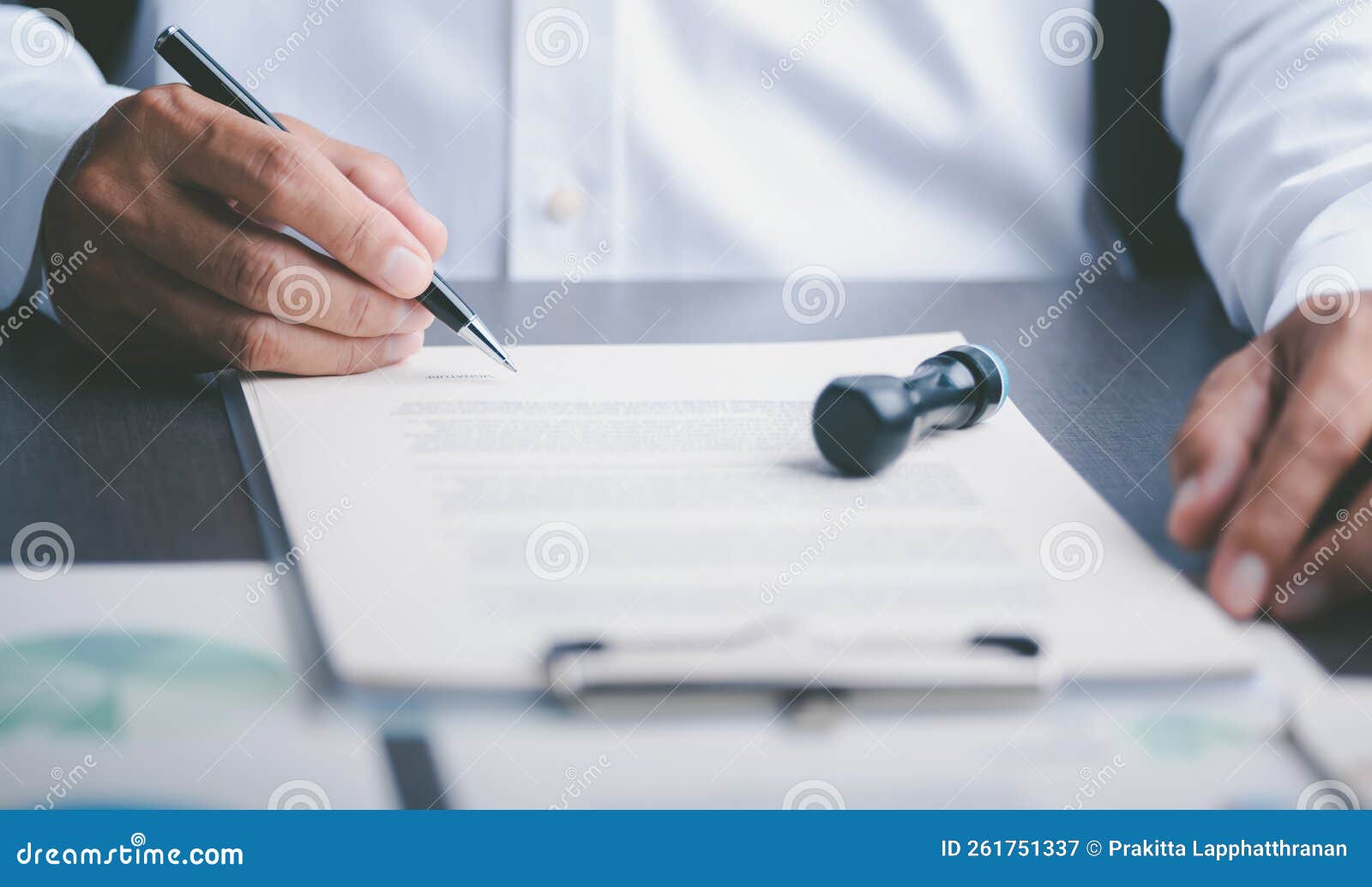 Young Businessman Checking and Analyze the Important Documents on the ...