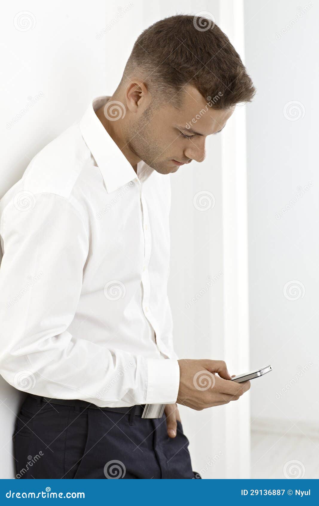 Young Businessman Checking Phone Call Stock Image - Image of face ...
