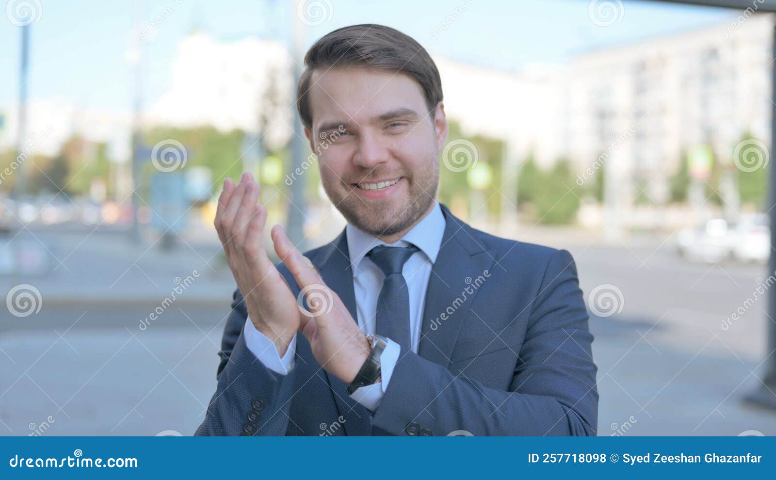 Young Businessman Clapping in Appreciation Outdoor Stock Photo - Image ...