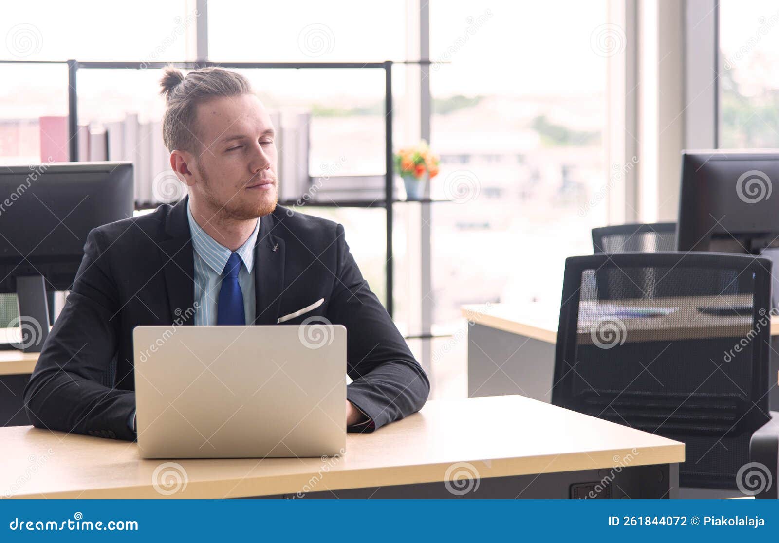 Young Businessman Closing Eyes for Take a Rest from Hard Work Stock ...