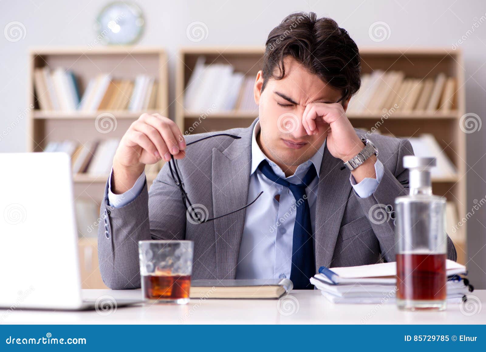 The Young Businessman Drinking from Stress Stock Image - Image of ...